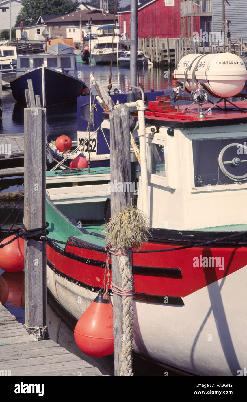 Boats at dockside in fishing village Eastern Passage Nova Scotia Canada ...
