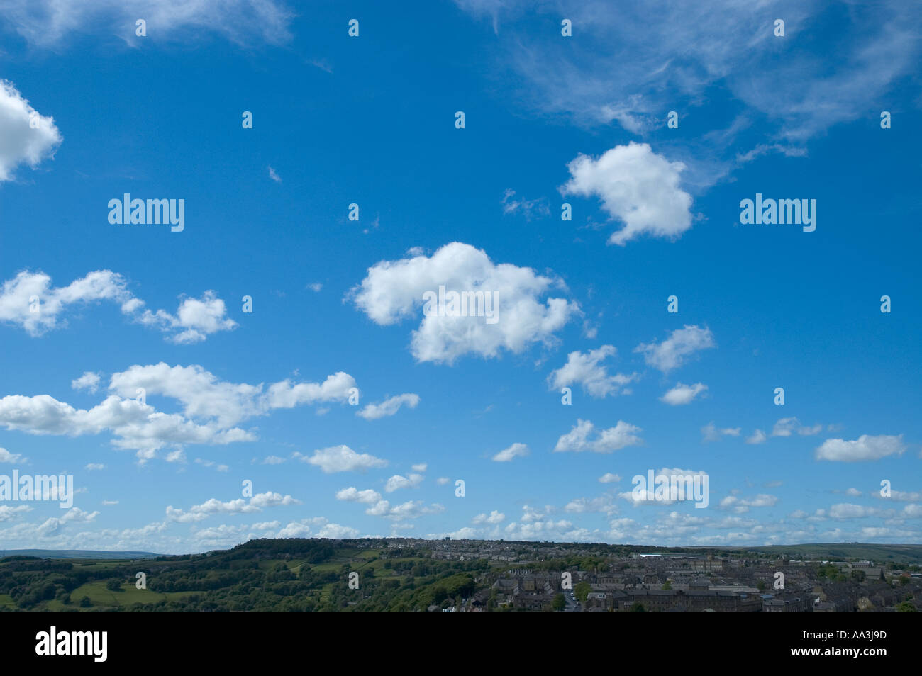 Blue sky and clouds above a rural landscape Stock Photo - Alamy