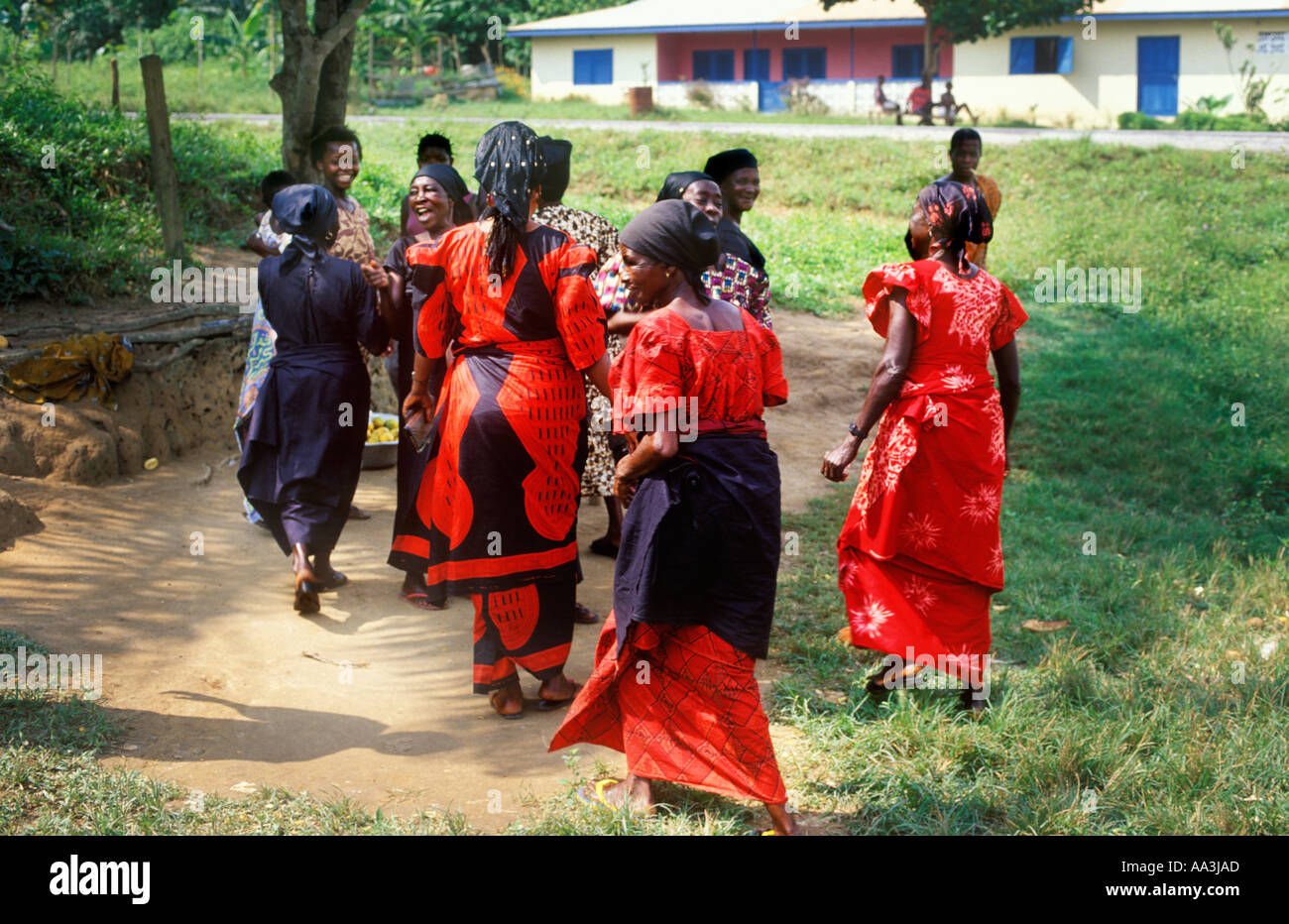 Women meet on their way to a gathering in Ghana Stock Photo - Alamy