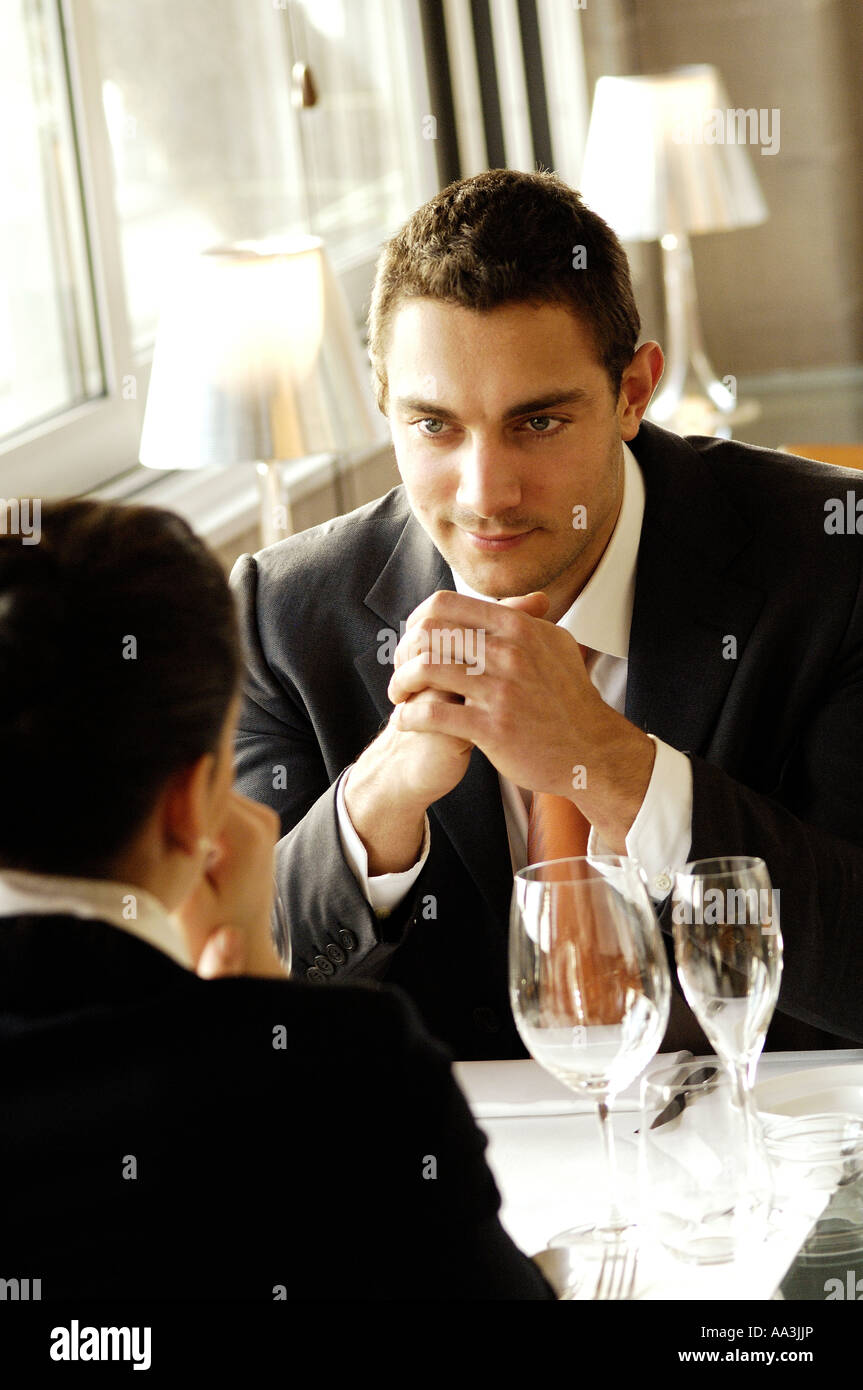 Two men one woman dinner hi-res stock photography and images - Alamy