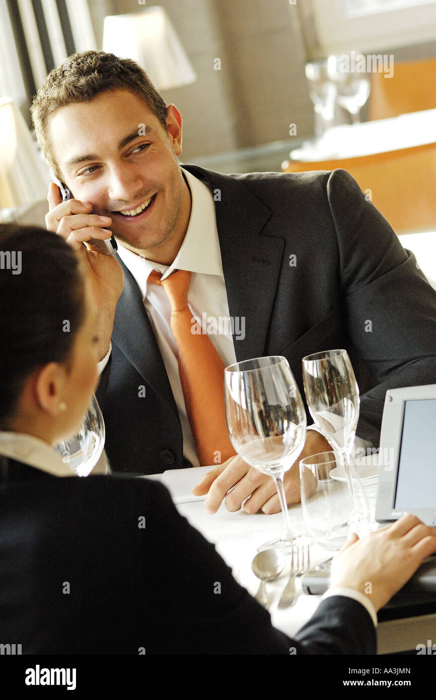 Two men one woman dinner hi-res stock photography and images - Alamy