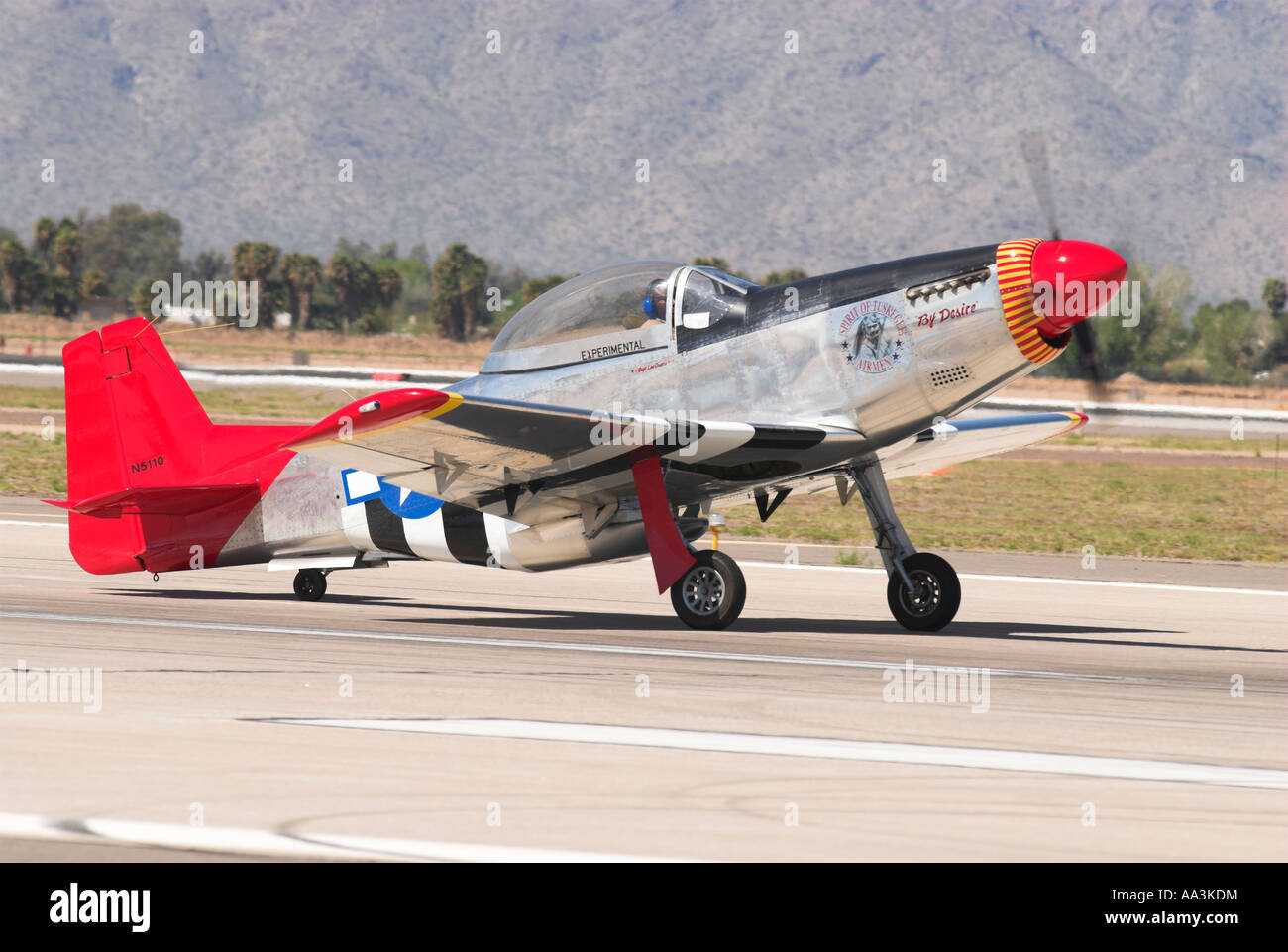 A Mustang P-51 (replica) with the markings of the Tuskegee Airmen as ...