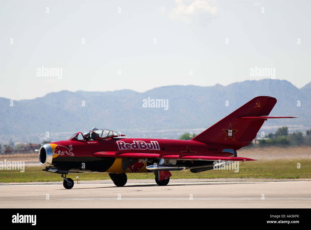 The "Red Bull" MiG-17 taxis on the runway Stock Photo - Alamy