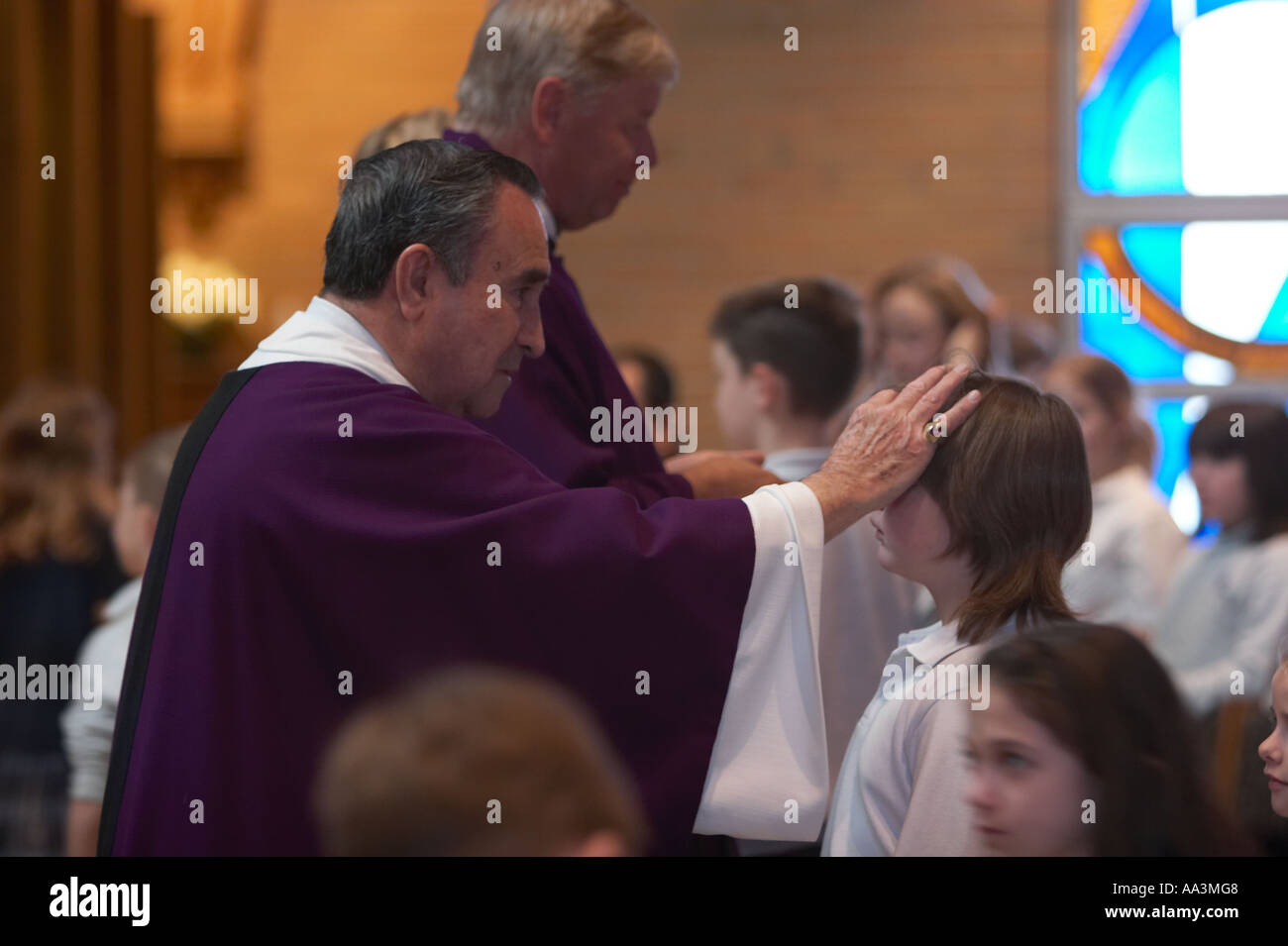 Ash wednesday forehead child hi-res stock photography and images - Alamy