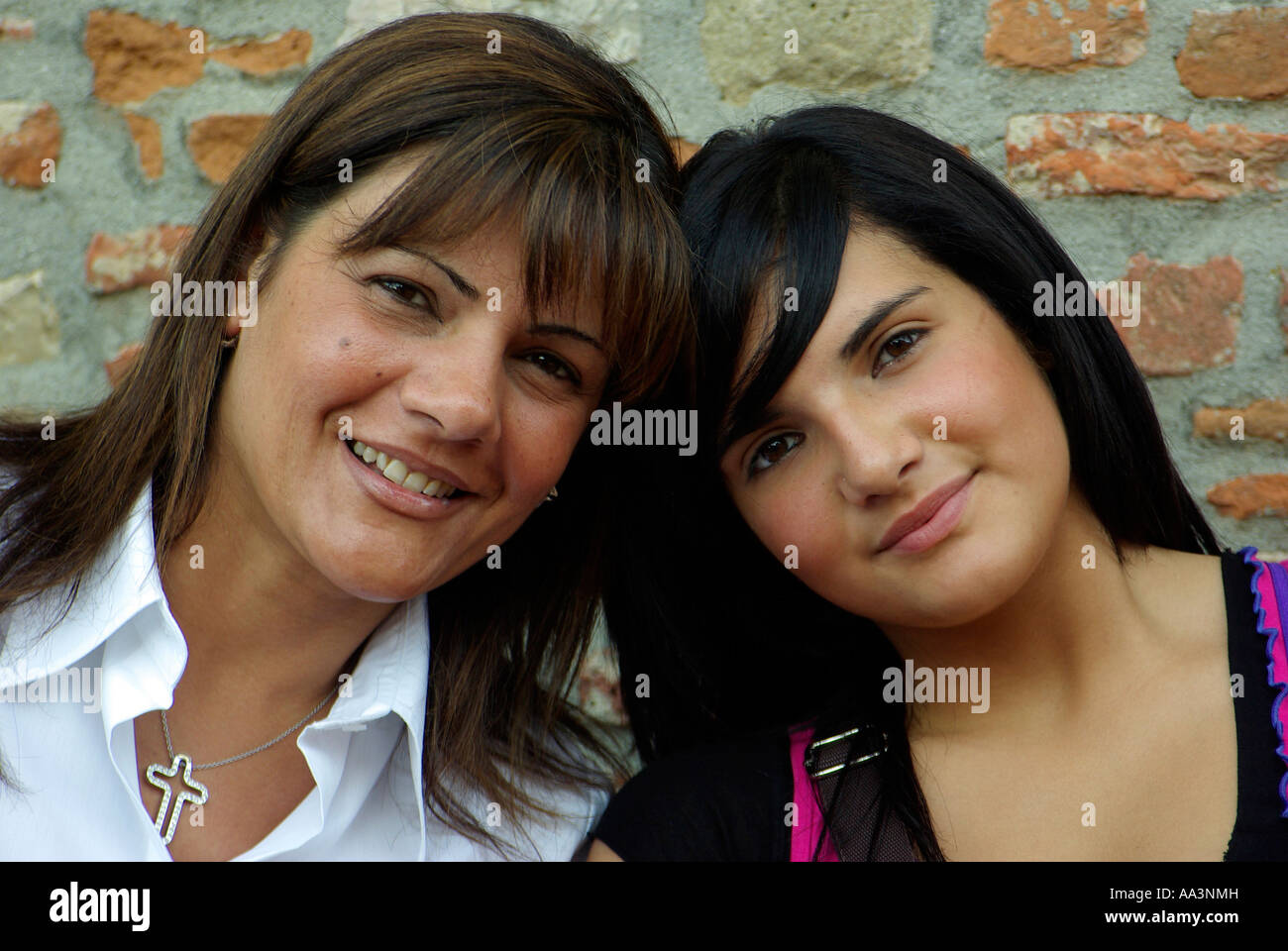 Mother and daughter beautiful Mediterranean complexion happy together ...