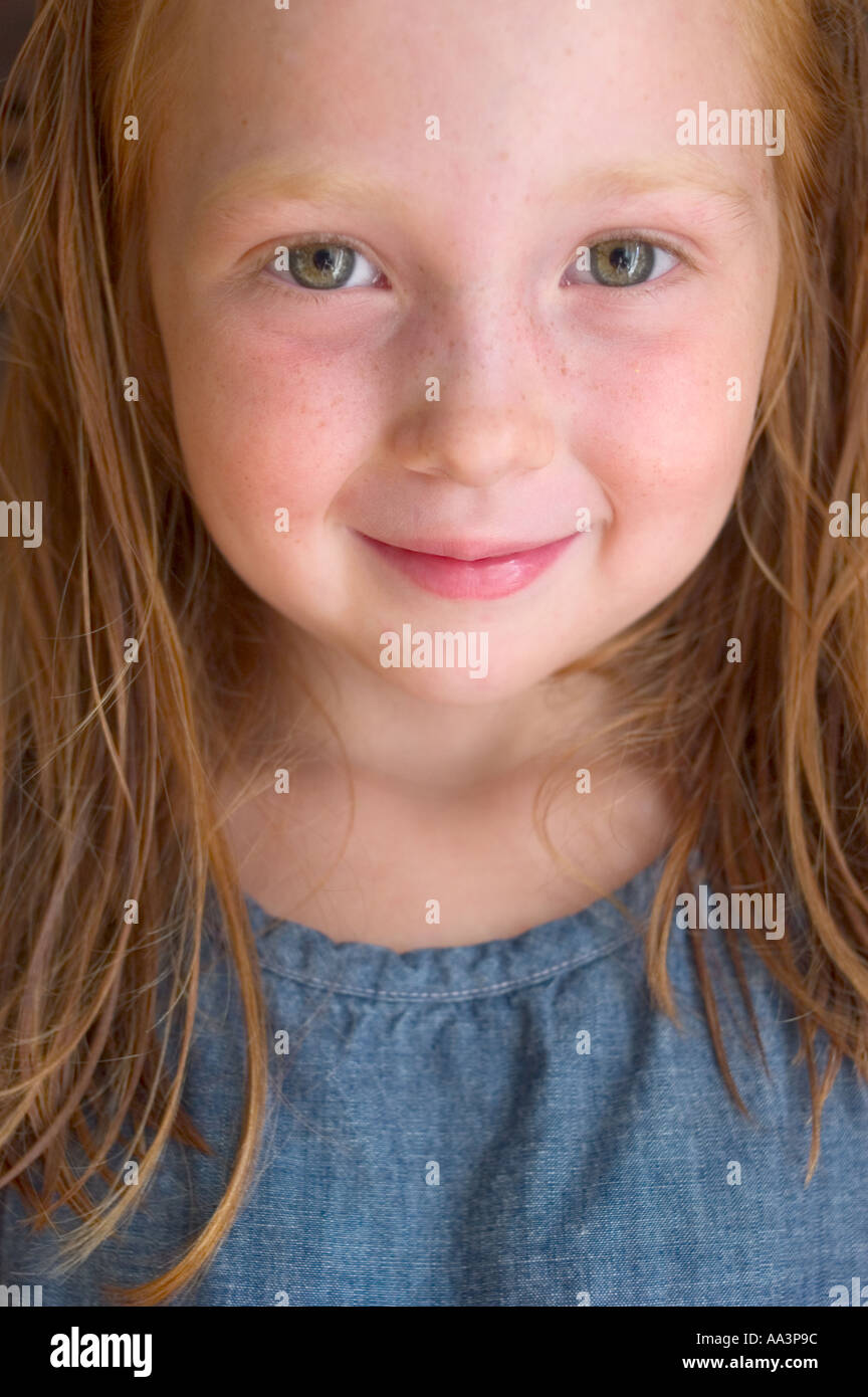 portrait of a young red haired girl smiling at the camera Stock Photo ...