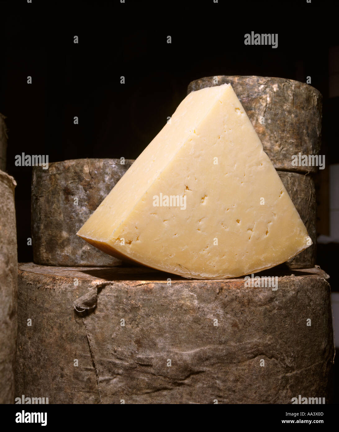 Traditional cloth bound Cheddar Cheeses on sale at Neals Yard Dairy ...