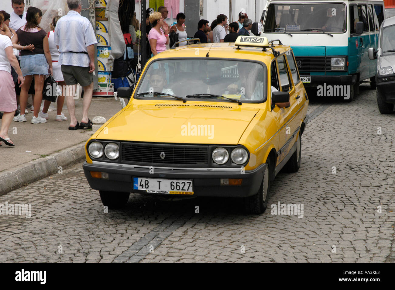 Yellow taxi on the streets of Bodrum in Turkey Stock Photo - Alamy