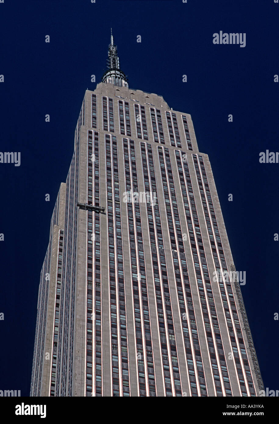 Window cleaners high on a suspended platform The Empire State Building ...