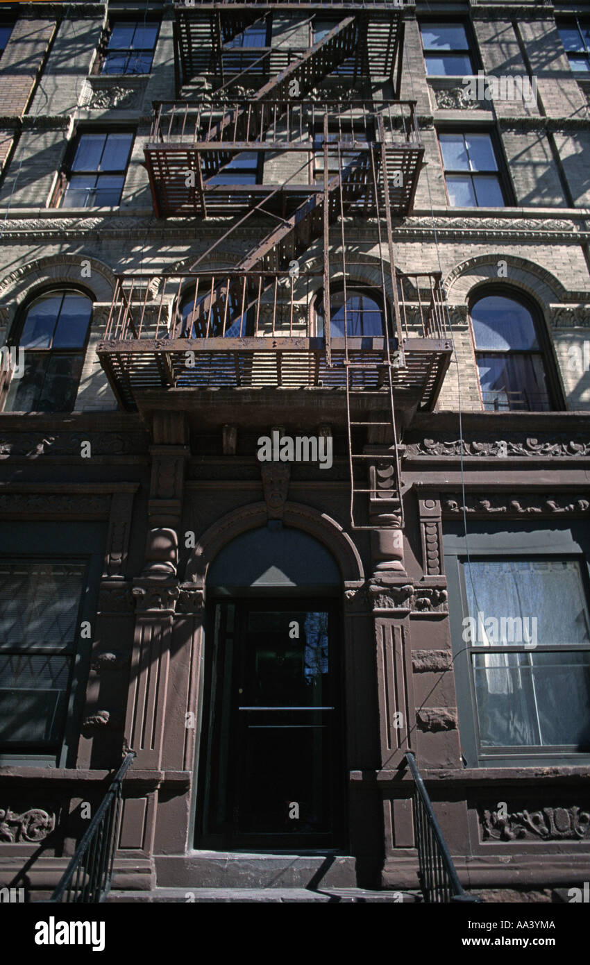 Fire escapes and ladders on a New York building A classic Manhattan ...