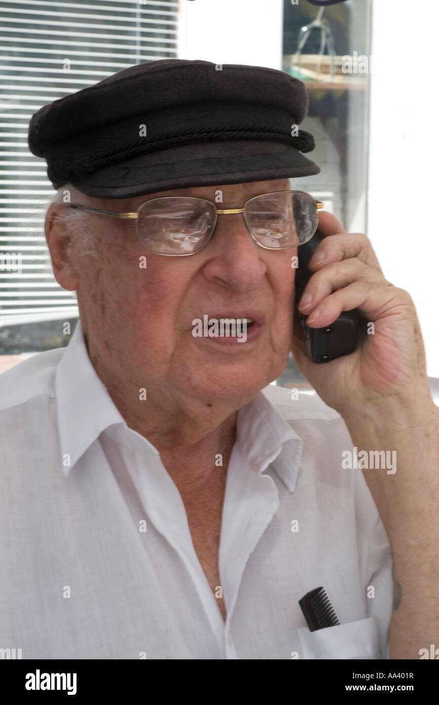 Old man with cellphone Stock Photo - Alamy