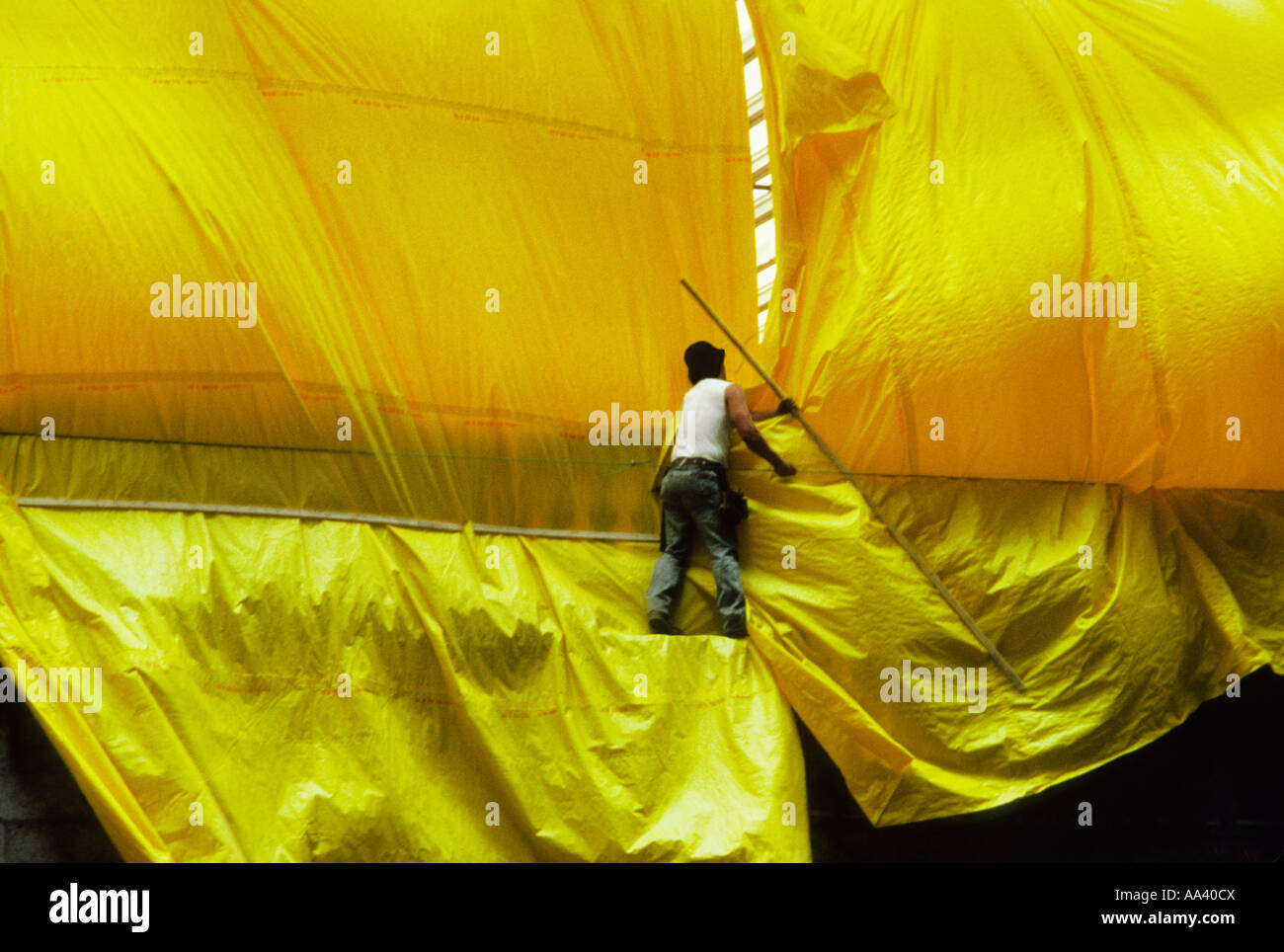Construction site worker. Hardhat preparing for renovation of building ...