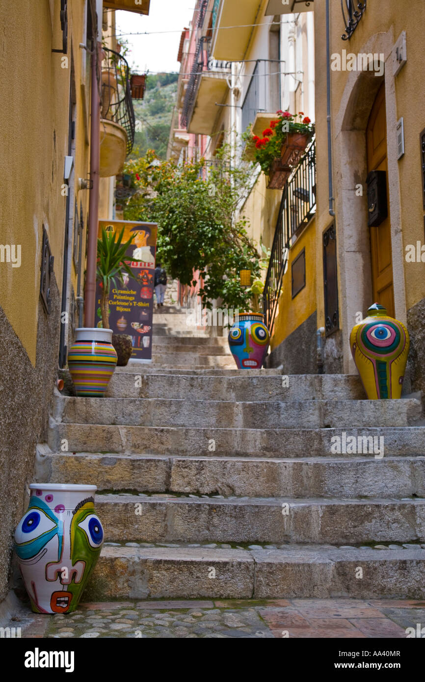 Hand made ceramic urns on stairs of Salita Guglielmo Melivia off Corso ...