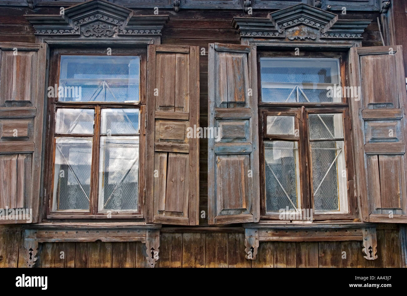 Windows with Ornamentic frames at different old Sibirian Wooden Houses ...