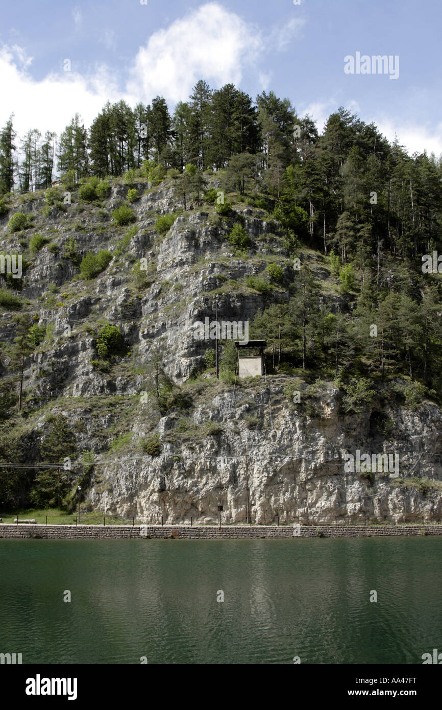 Fondo, Italy: Lake Smeraldo nestled among woodlands in the Dolomite ...