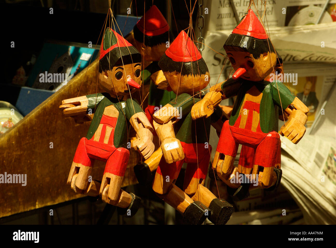 Wooden Pinocchio puppets hang in Florentine tourist shop Tuscany Italy ...