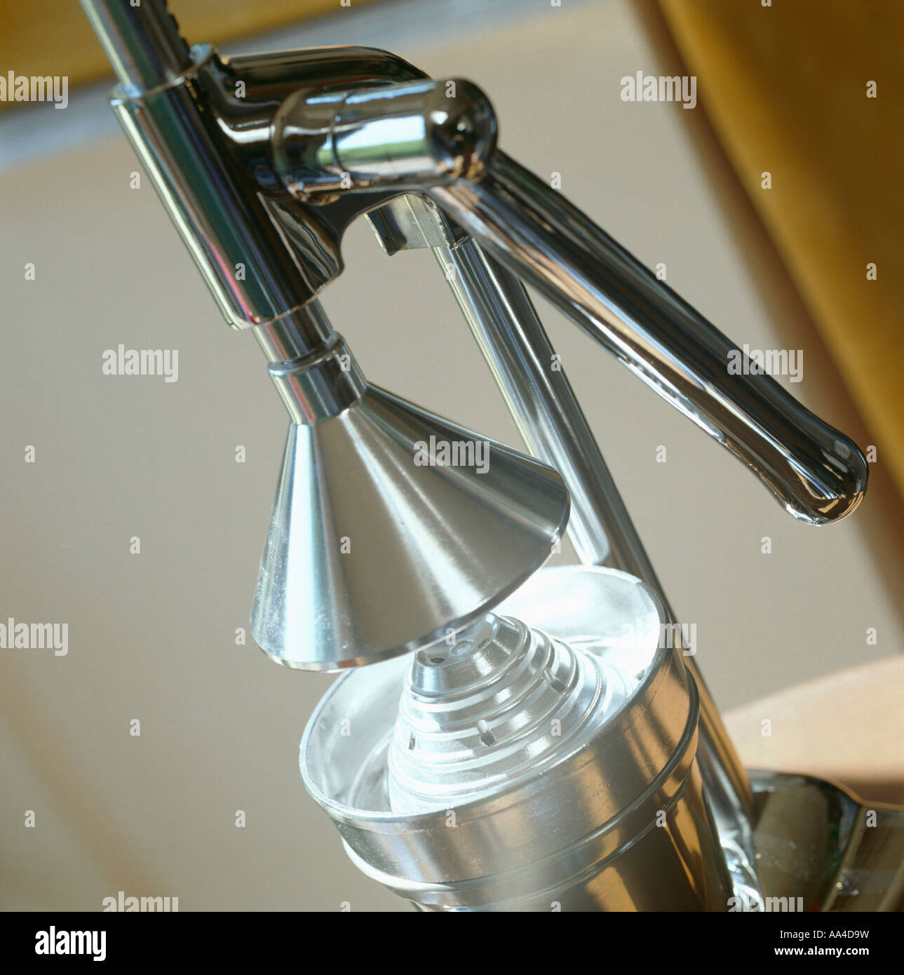 Close-up of chrome juicer with lever Stock Photo - Alamy