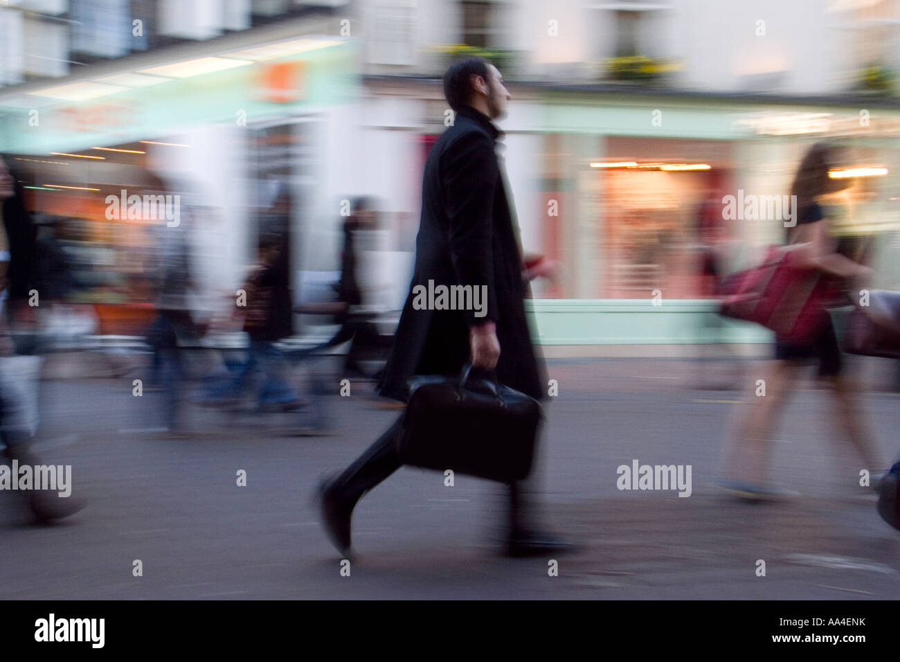 Man walking london street hi-res stock photography and images - Alamy