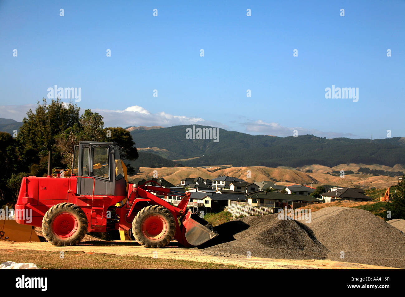 Earth moving equipment in hills Stock Photo - Alamy