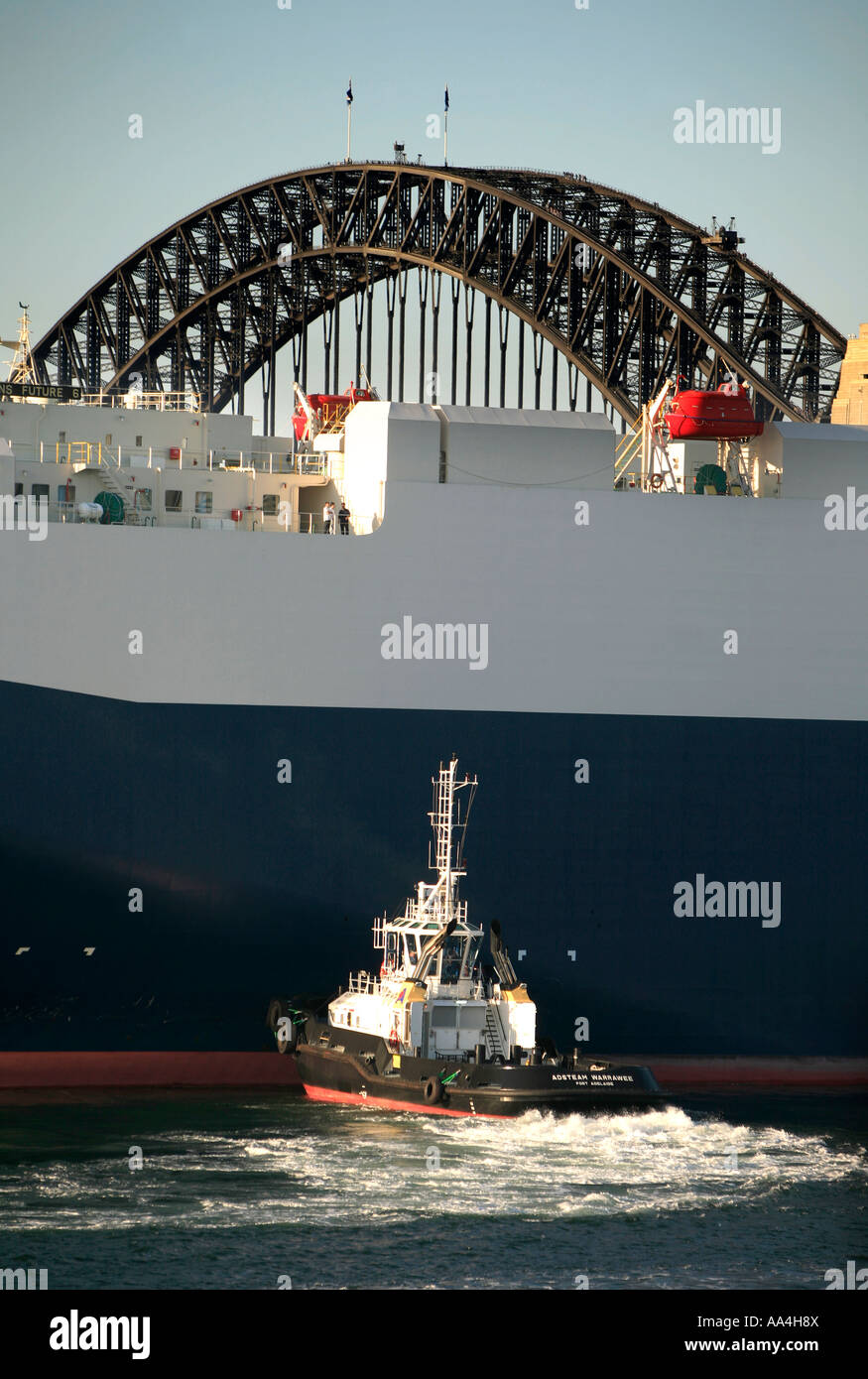 The Tug Adsteam Warawee uses full power to turn the car carrier Trans ...
