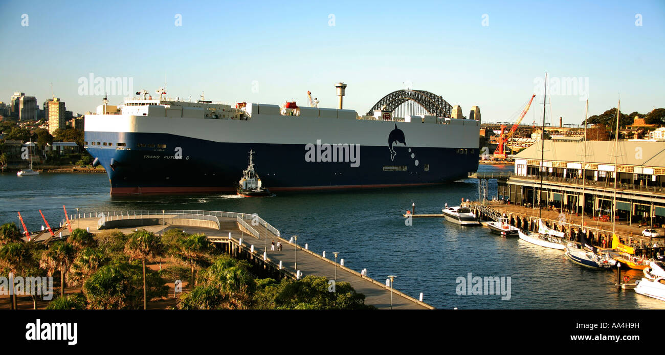 The Tug Adsteam Warawee uses full power to turn the car carrier Trans ...