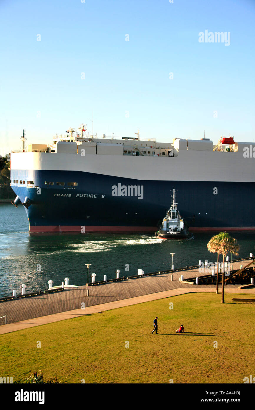 The Tug Adsteam Warawee uses full power to turn the car carrier Trans ...