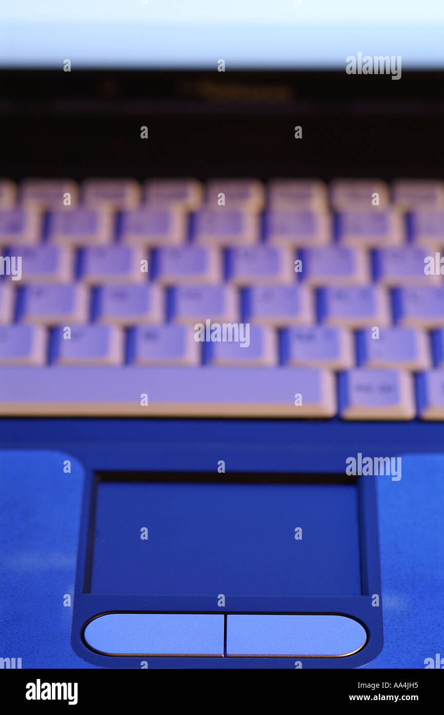 Laptop keyboard with blue light from screen Stock Photo - Alamy