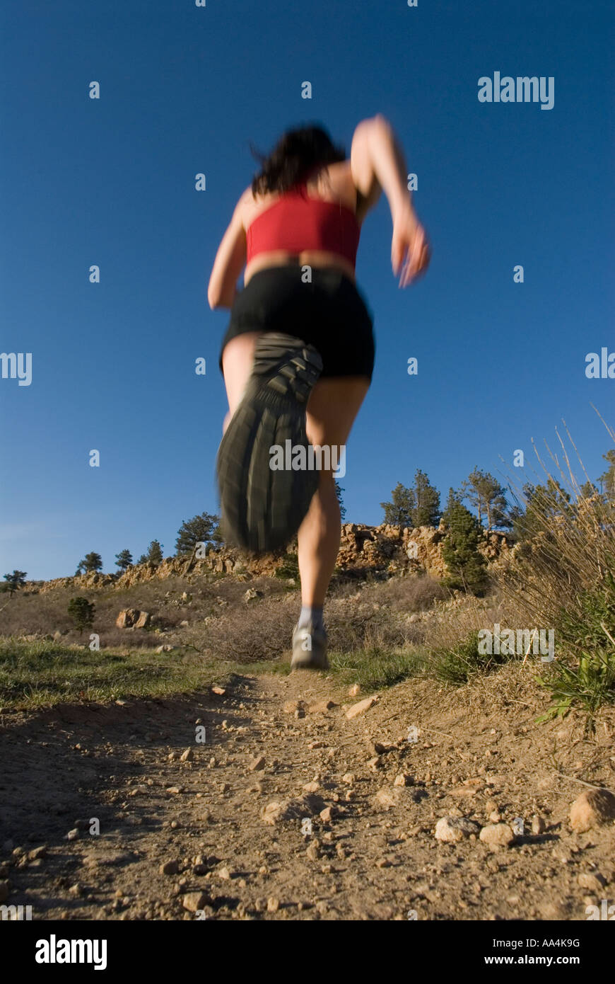 Woman run low angle feet hi-res stock photography and images - Alamy