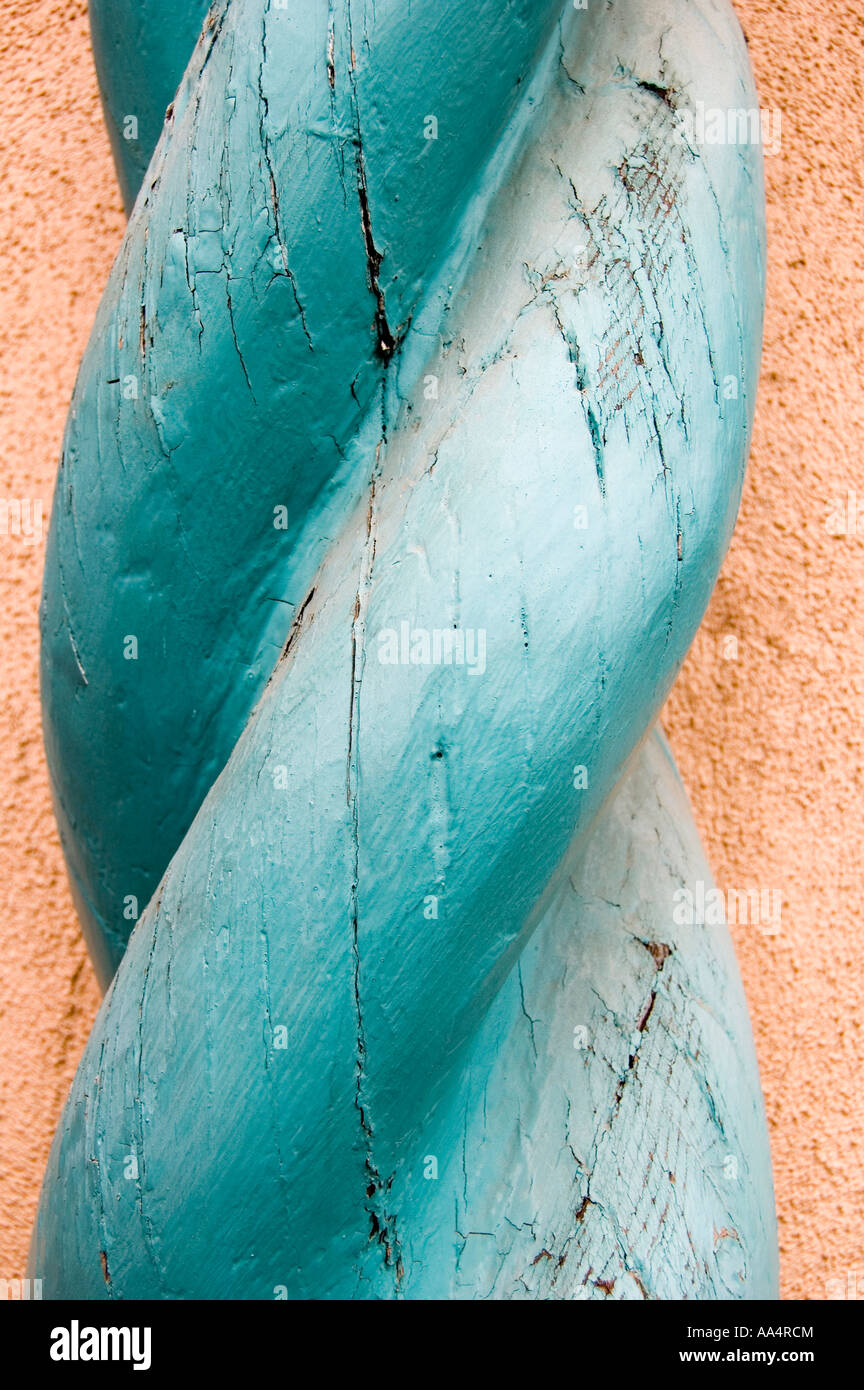 Twisted blue wood carving detail Stock Photo - Alamy