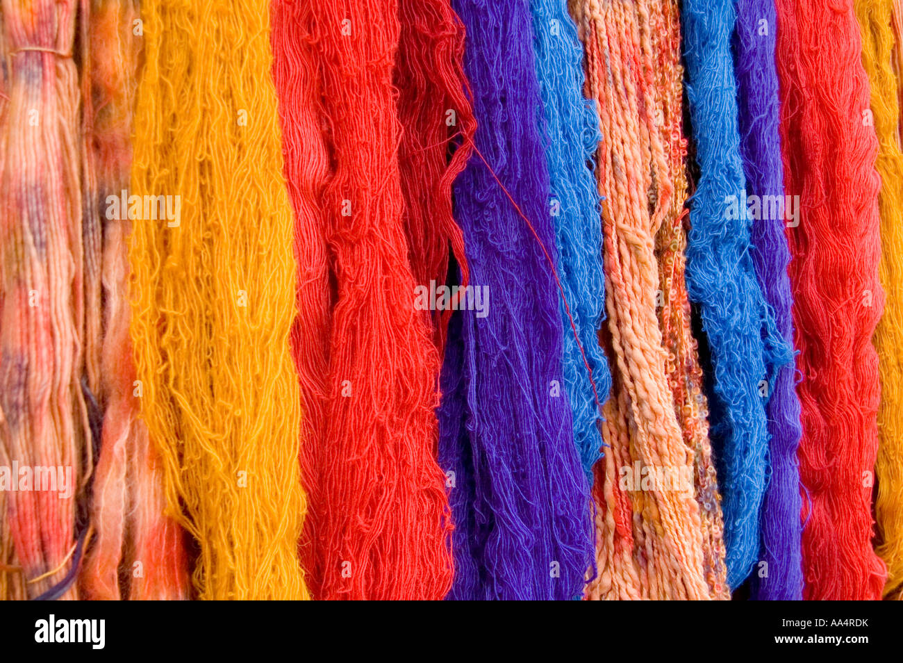 Close up of multi-colored yarns Stock Photo - Alamy