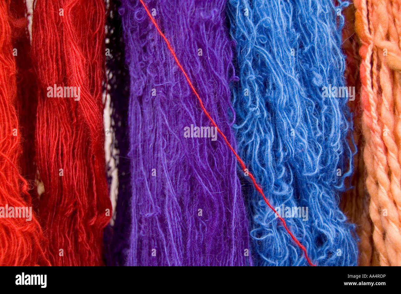 Close up of multi-colored yarns Stock Photo - Alamy