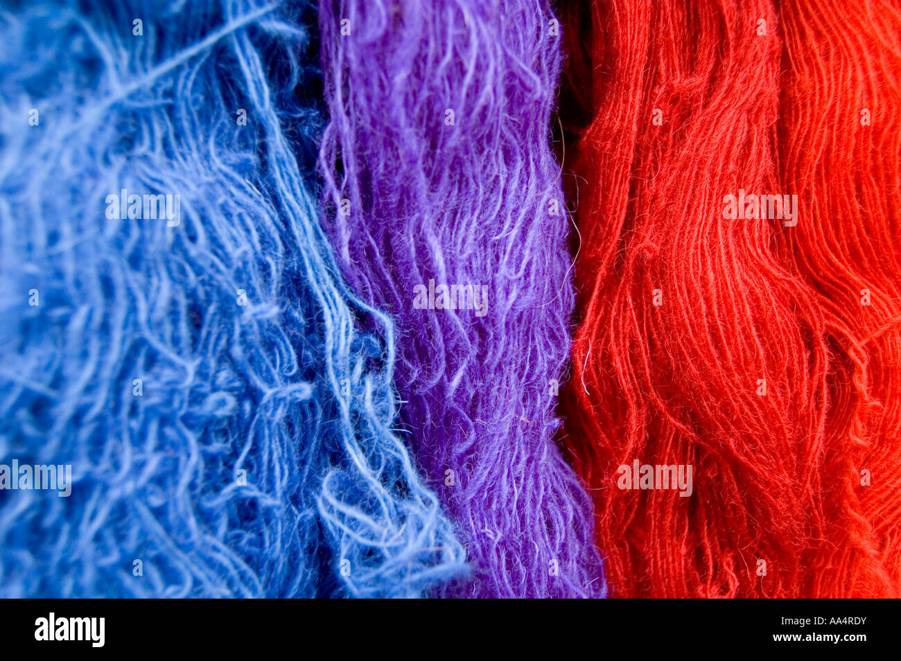 Close up of multi-colored yarns Stock Photo - Alamy