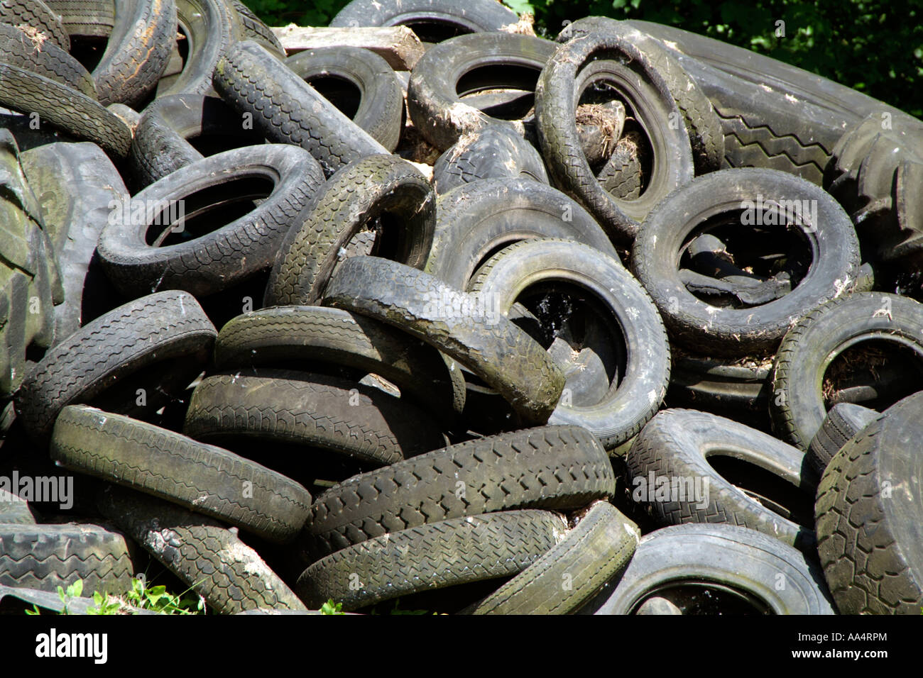 stack of old rubber tyres Stock Photo - Alamy