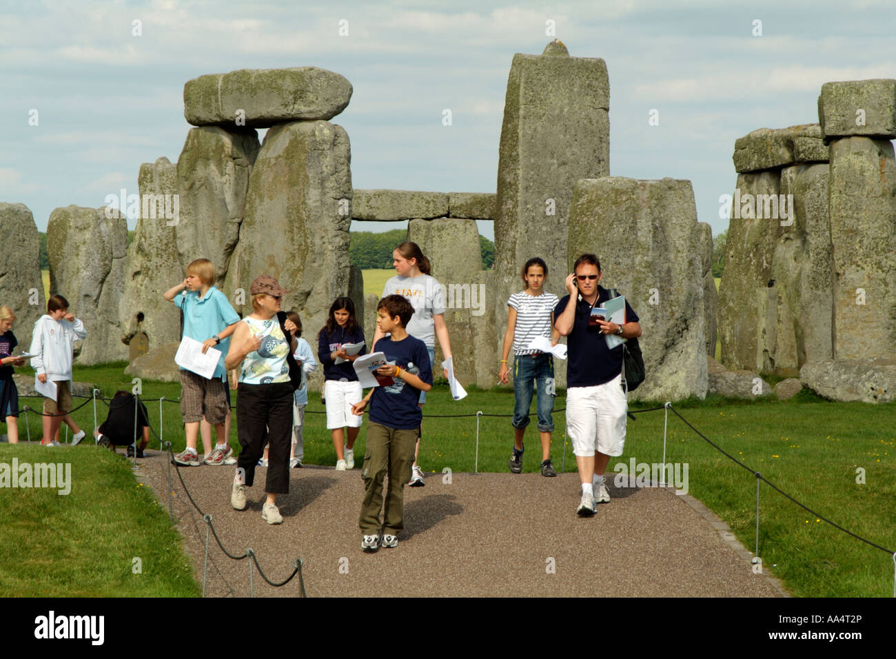 Stonehenge monument Wiltshire England UK Tourists visiting the stone ...