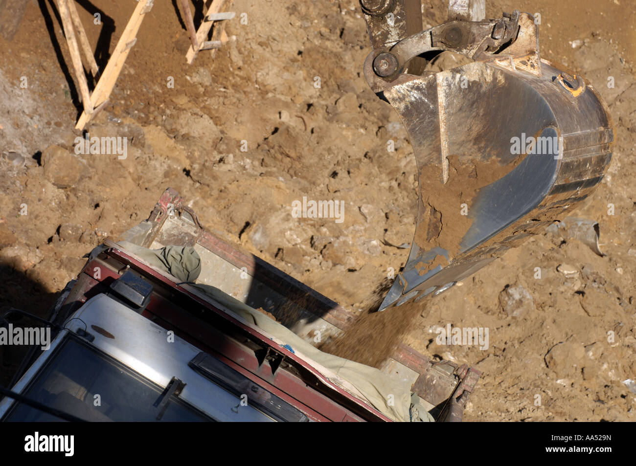 lorry and excavator Stock Photo - Alamy