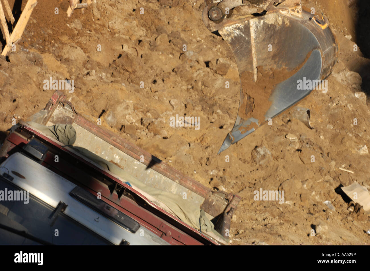 lorry and excavator Stock Photo - Alamy