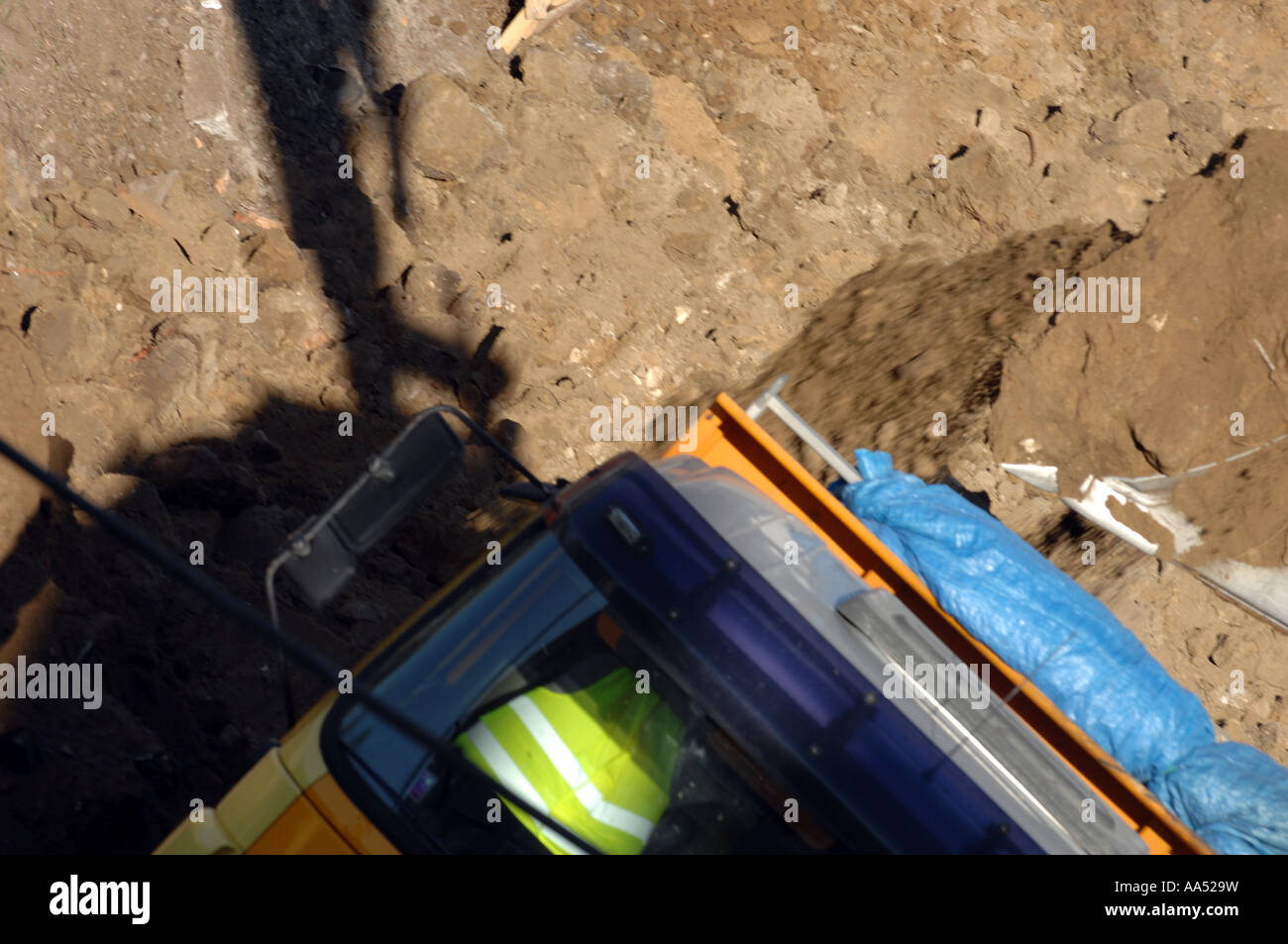 lorry and excavator Stock Photo - Alamy