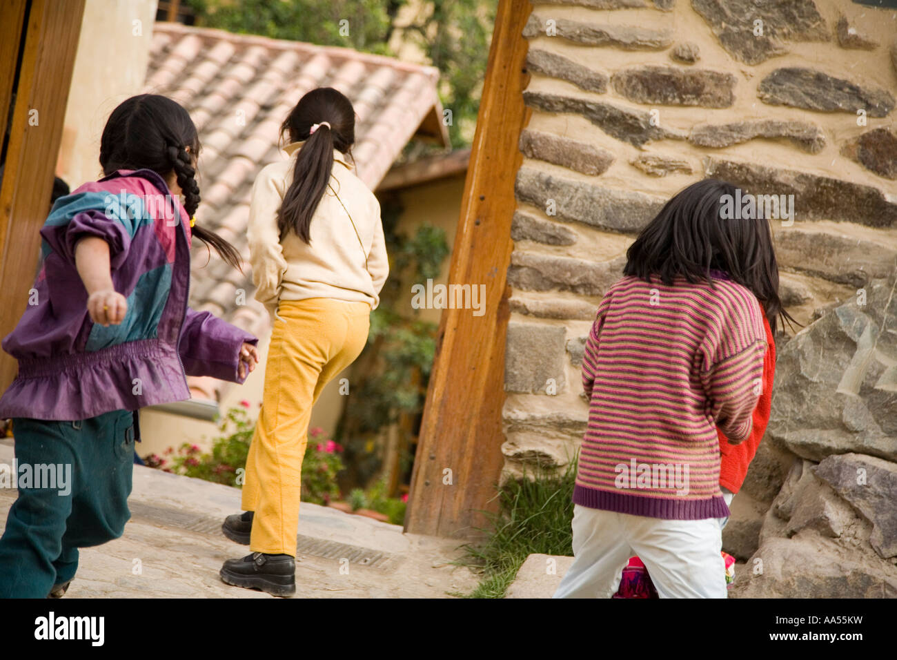 Children playing hide and seek in Ollantytambo, Peru Stock Photo - Alamy