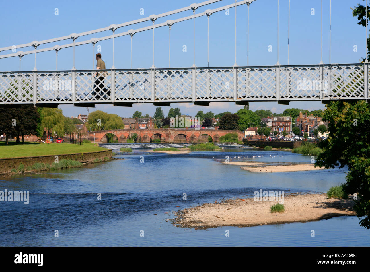 old Victorian suspension footbridge across the River Nith dumfries ...