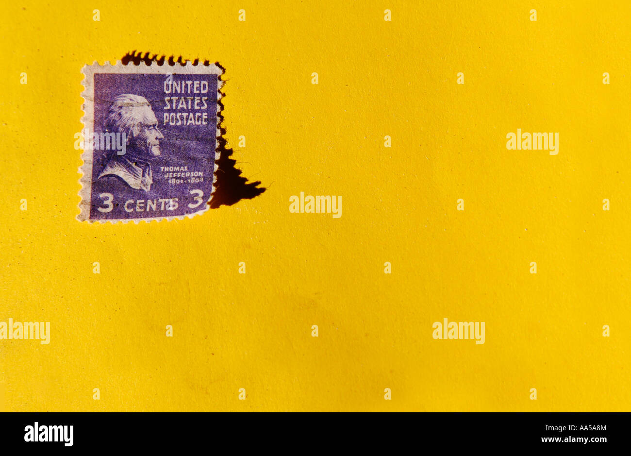 vintage purple three cent stamp on yellow paper Stock Photo - Alamy