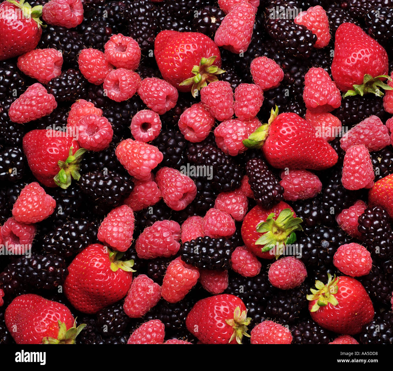 Background of strawberries raspberries and blackberries Stock Photo - Alamy
