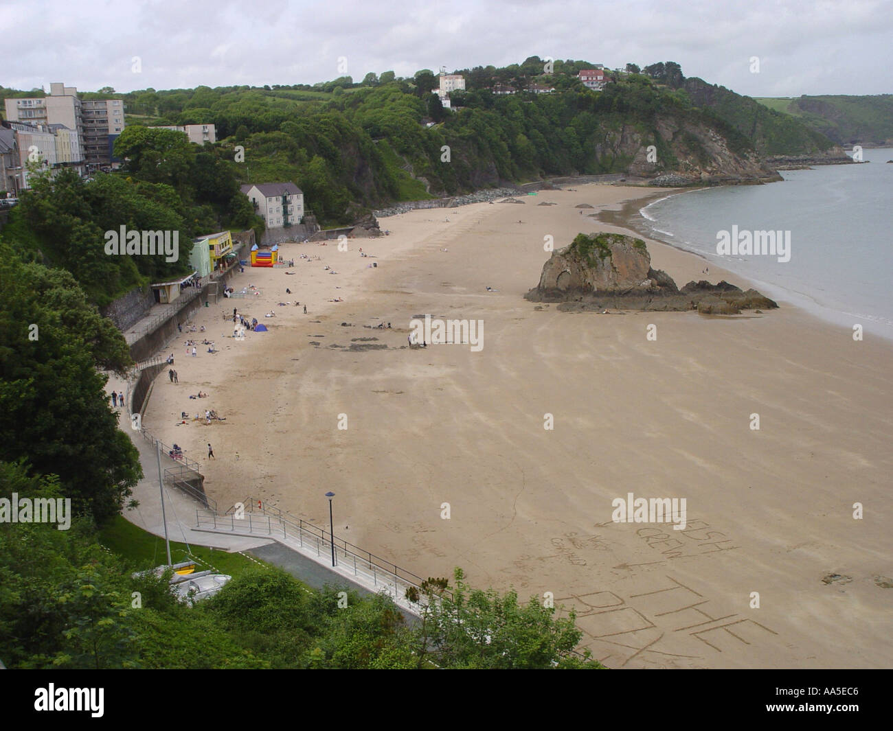 Goskar Rock on North Beach in the seaside town of Tenby Pembrokeshire ...