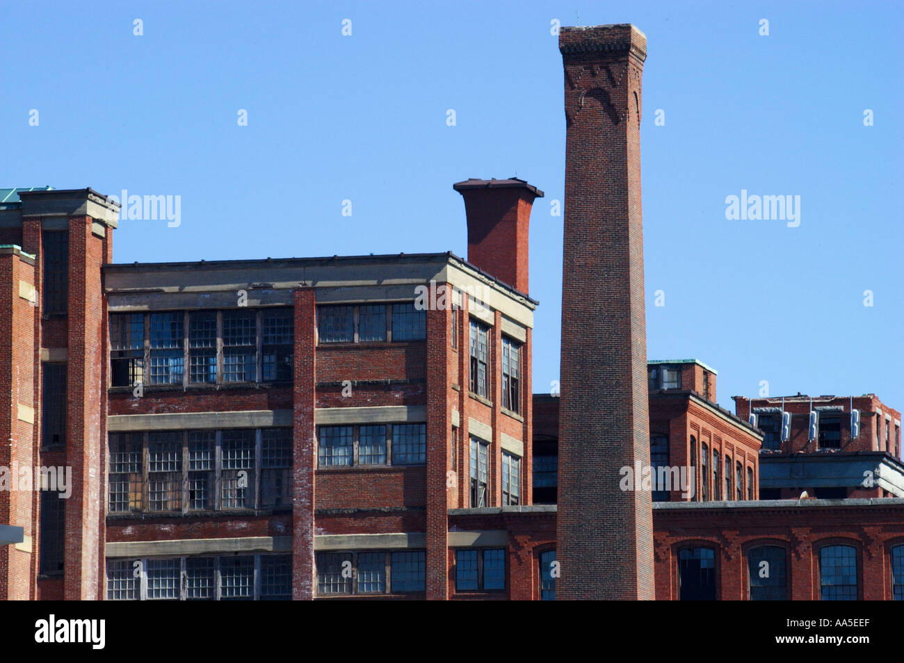 Industrial Buildings with Smokestack Stock Photo - Alamy