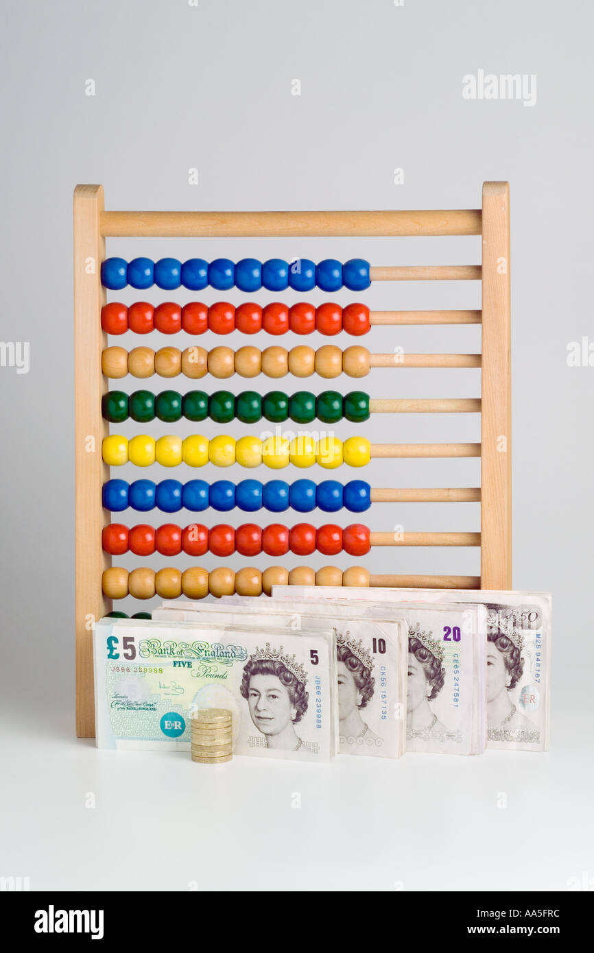 Colourful abacus counting frame with UK British bank notes money ...