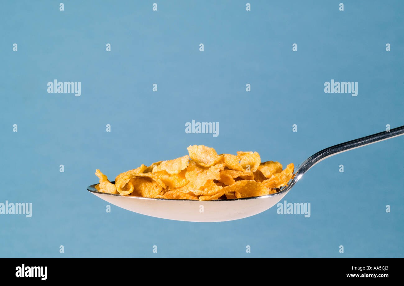 Spoonful of breakfast cereal cornflakes food Stock Photo - Alamy