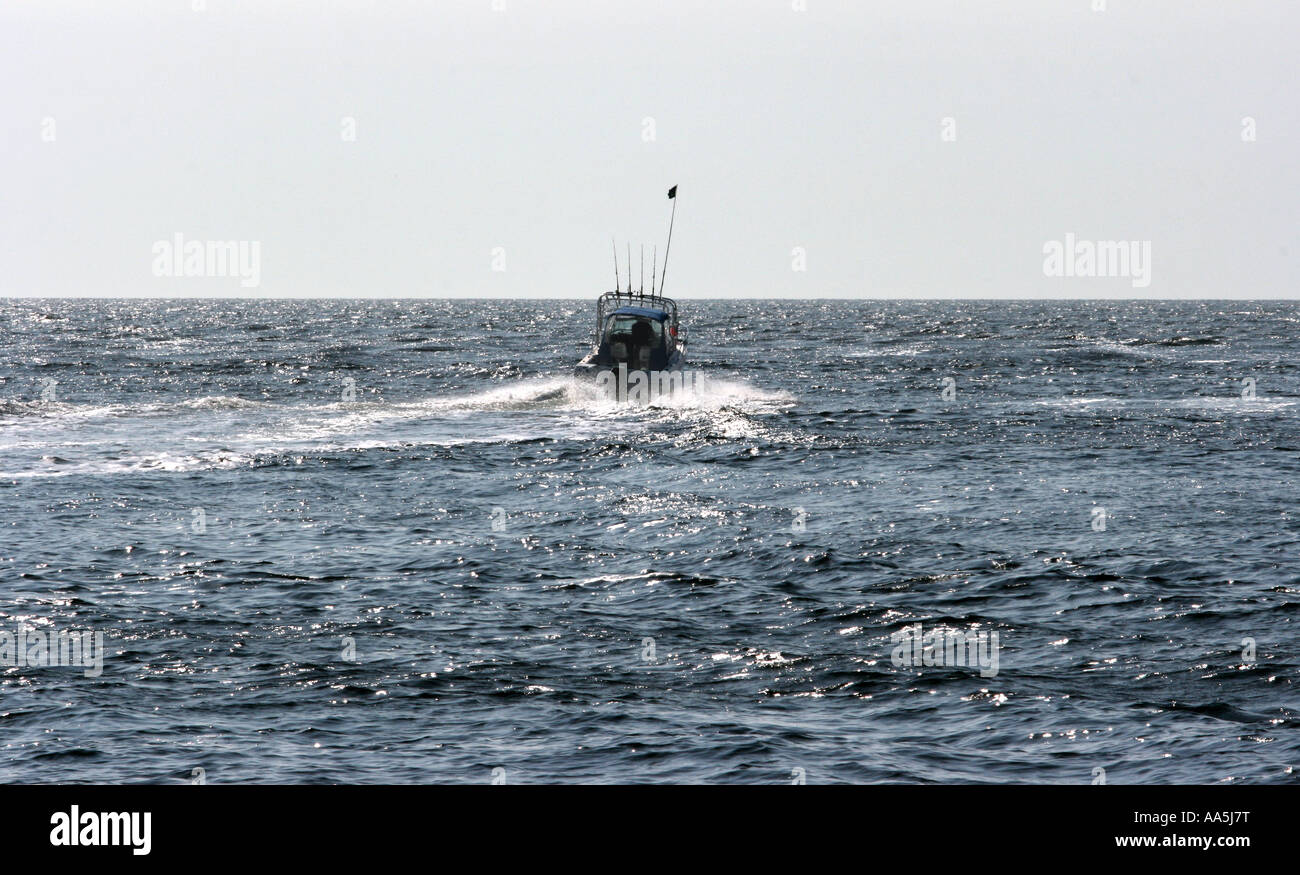 A private fishing boat at the mouth of the Manasquan Inlet. The ...