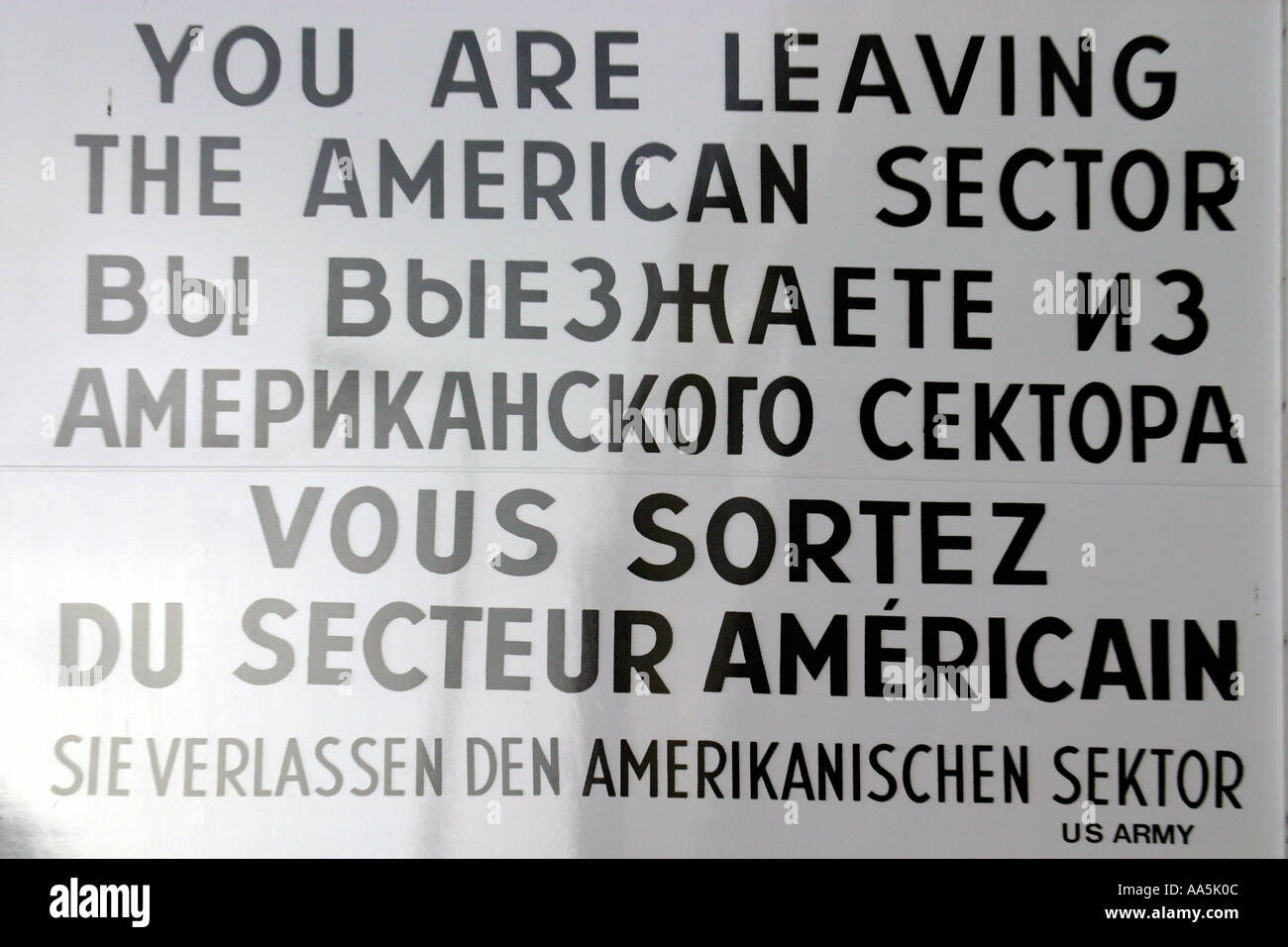 Germany Berlin old sign at Checkpoint Charlie Stock Photo - Alamy