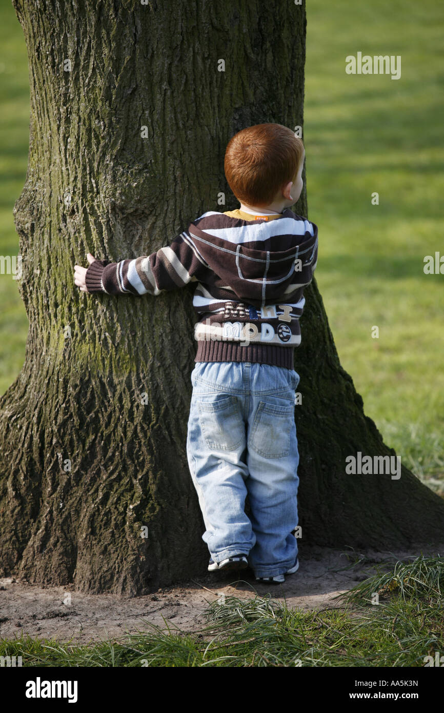 Small boy peeping hi-res stock photography and images - Alamy