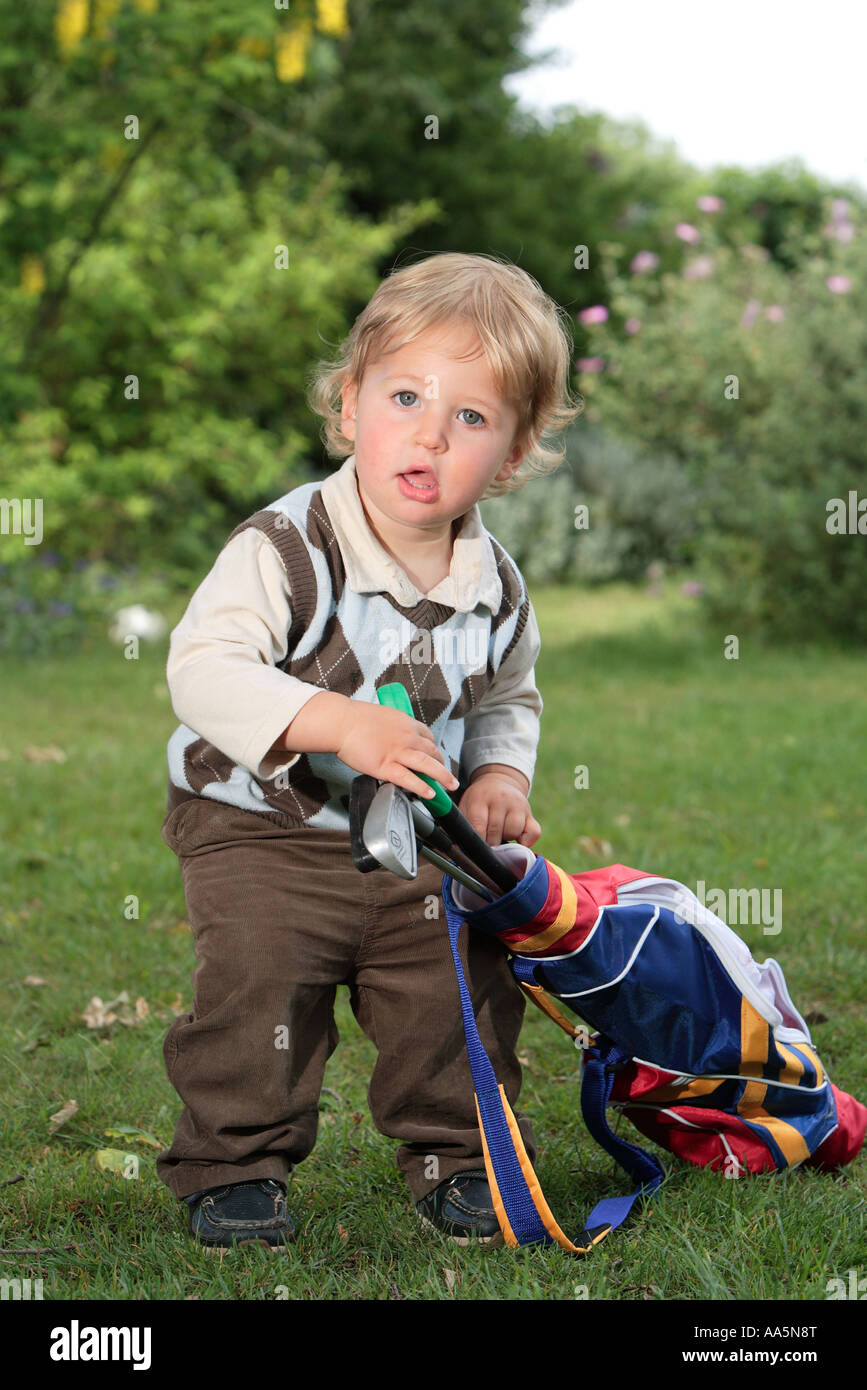 A TODDLER PLAYING GOLF Stock Photo - Alamy