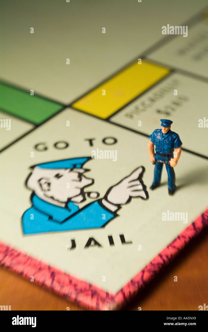 cop on a monopoly board Stock Photo - Alamy